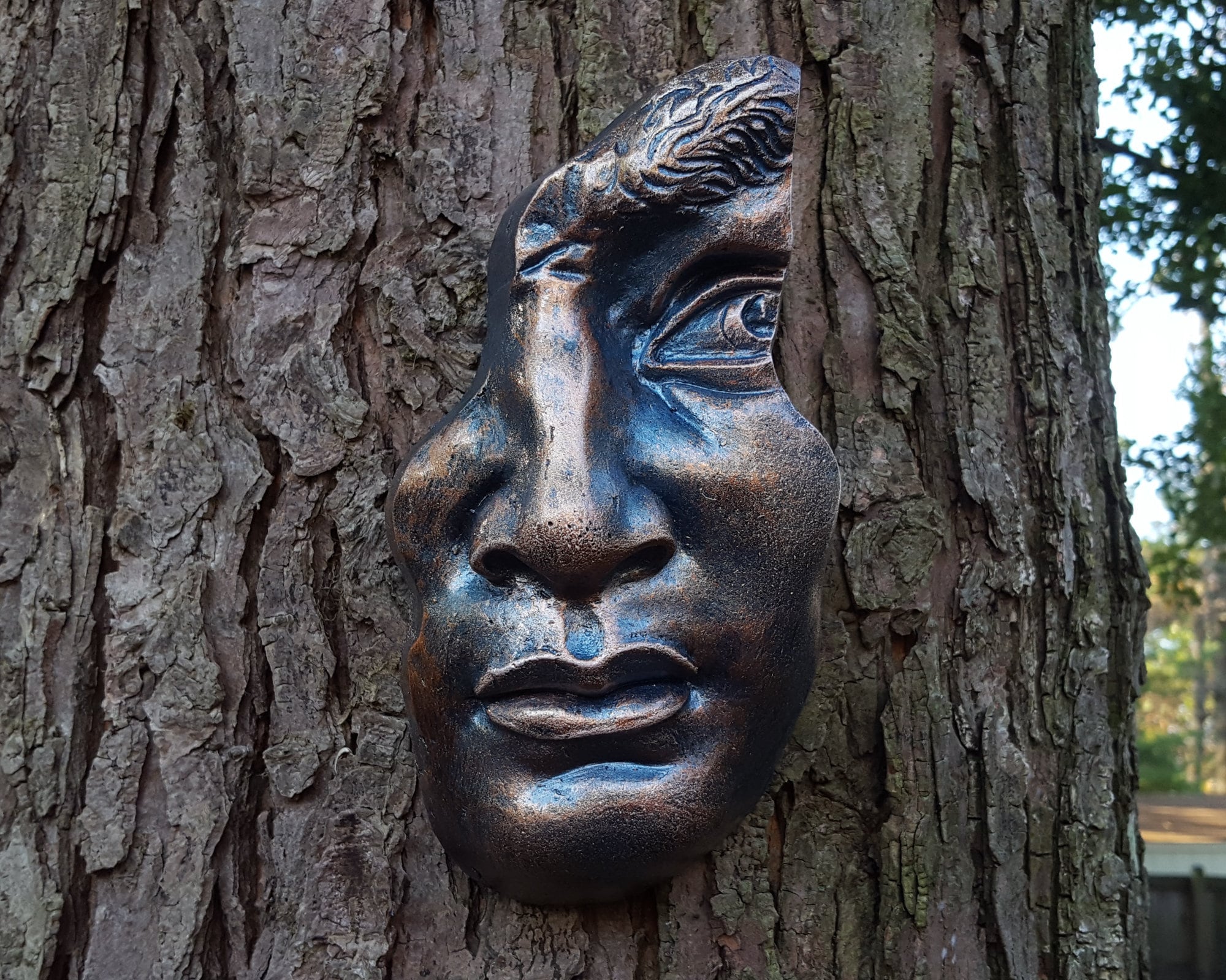 Stone Face Sculpture