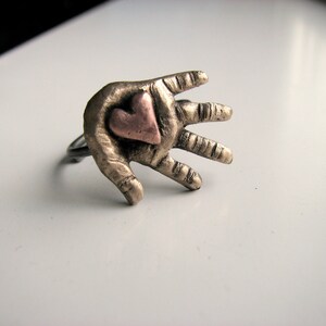 Heart in Hand Ring - Etsy