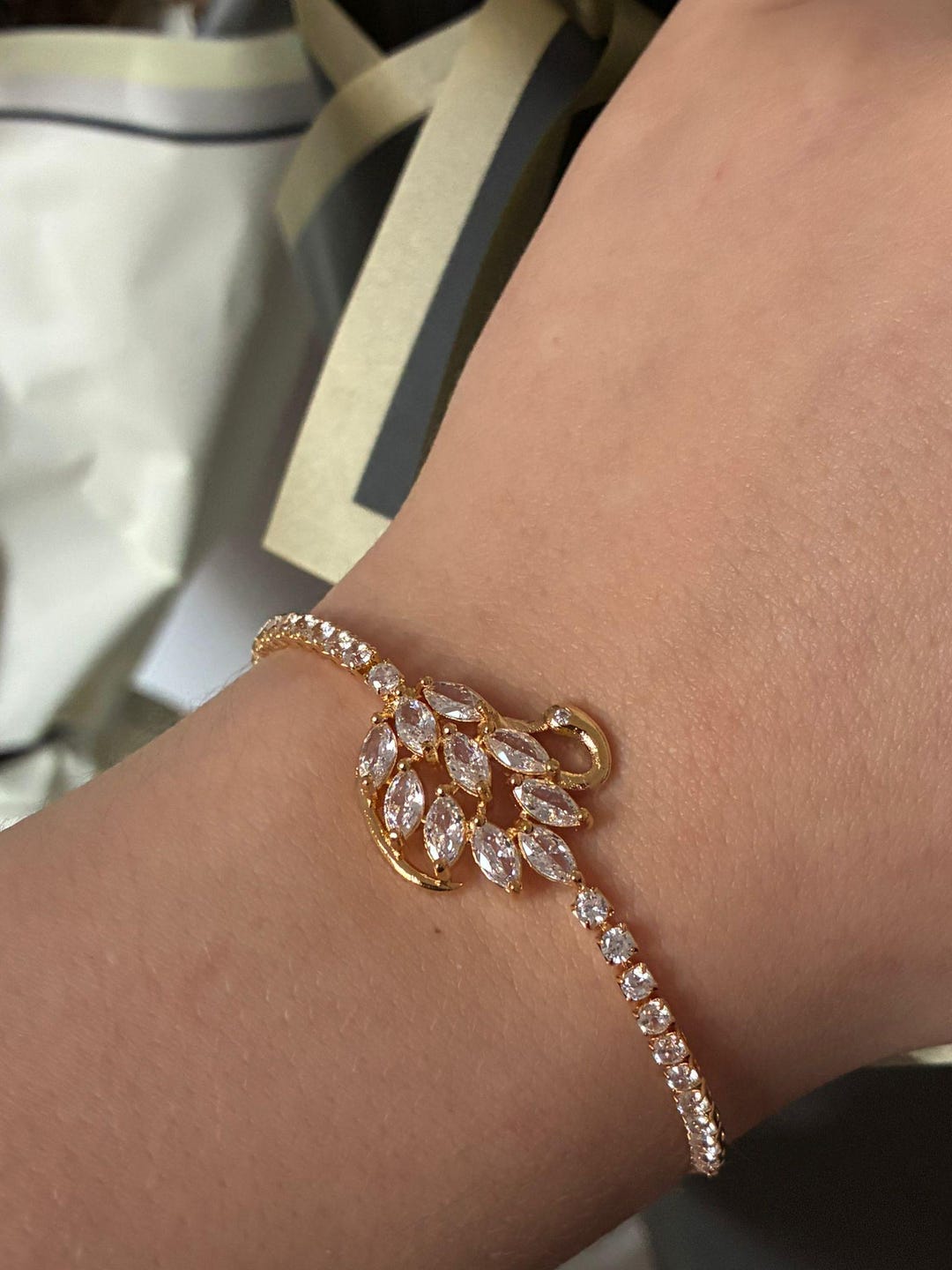 Swan Motif Stone Bracelet - Elegant Gold Jewelry With Marquise Cut ...