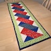 Colorful Ribbon Twist Quilted Table Runner - Tulip Square Pattern #576 ...