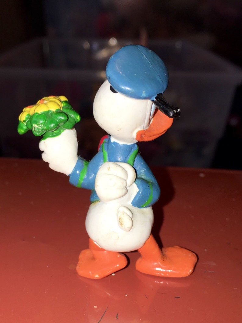 Vintage PVC Walt Disney Donald Duck with flower bouquet figure | Etsy