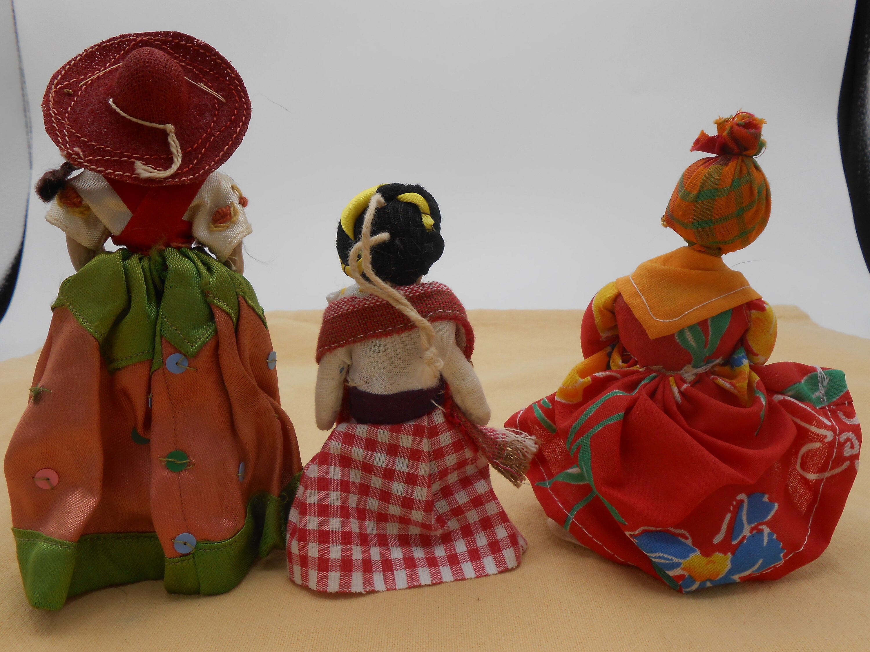 Three Latin Costume Dolls and Pair of Embroidered Doll Shoes, South ...