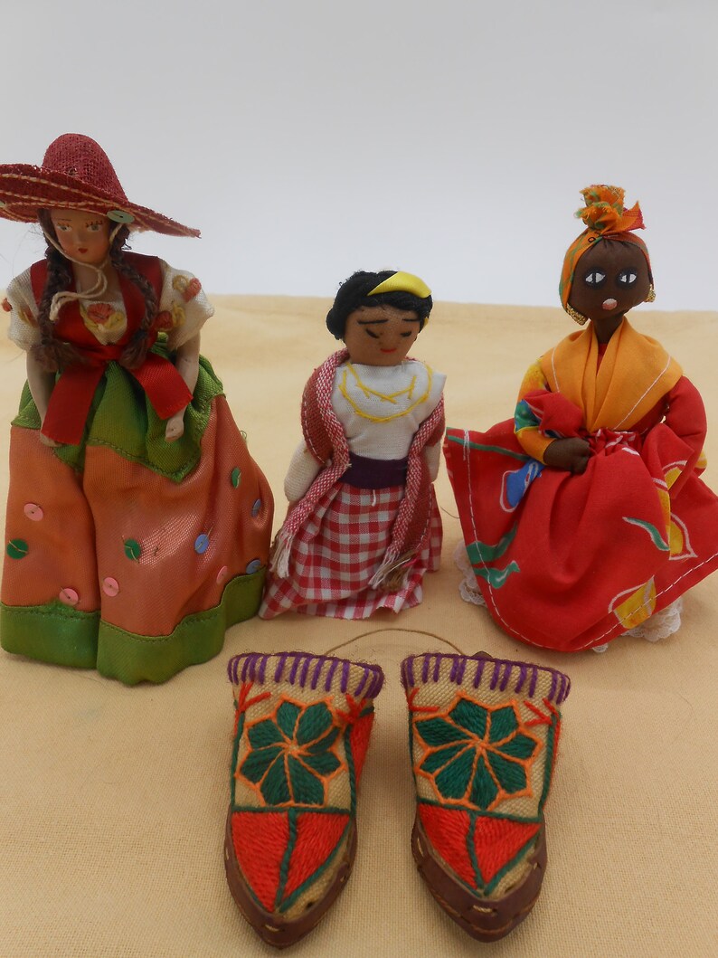 Three Latin Costume Dolls and Pair of Embroidered Doll Shoes, South ...