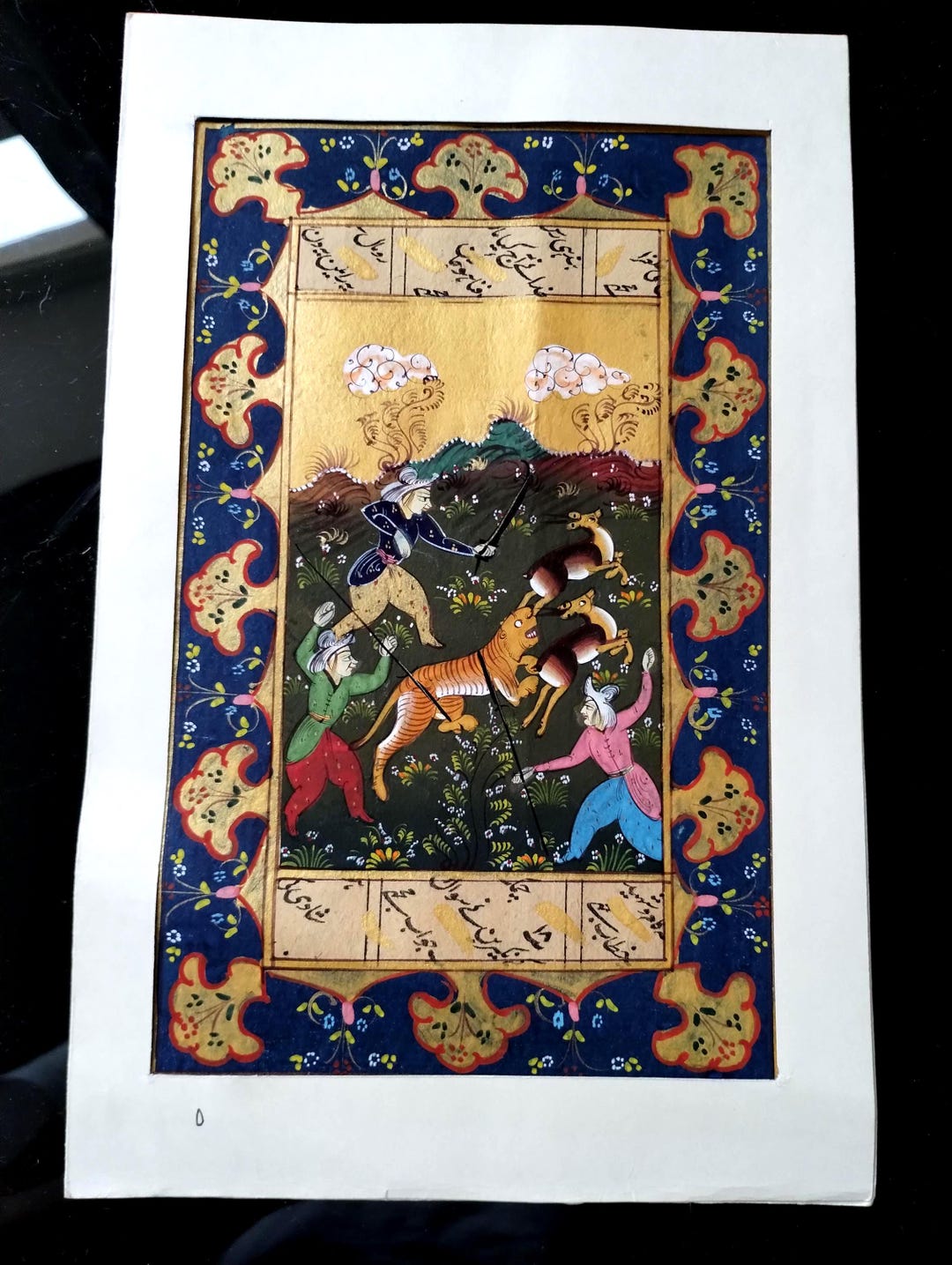 A Refined Persian Miniature Depicting Hunting Scenes, With Gilded ...