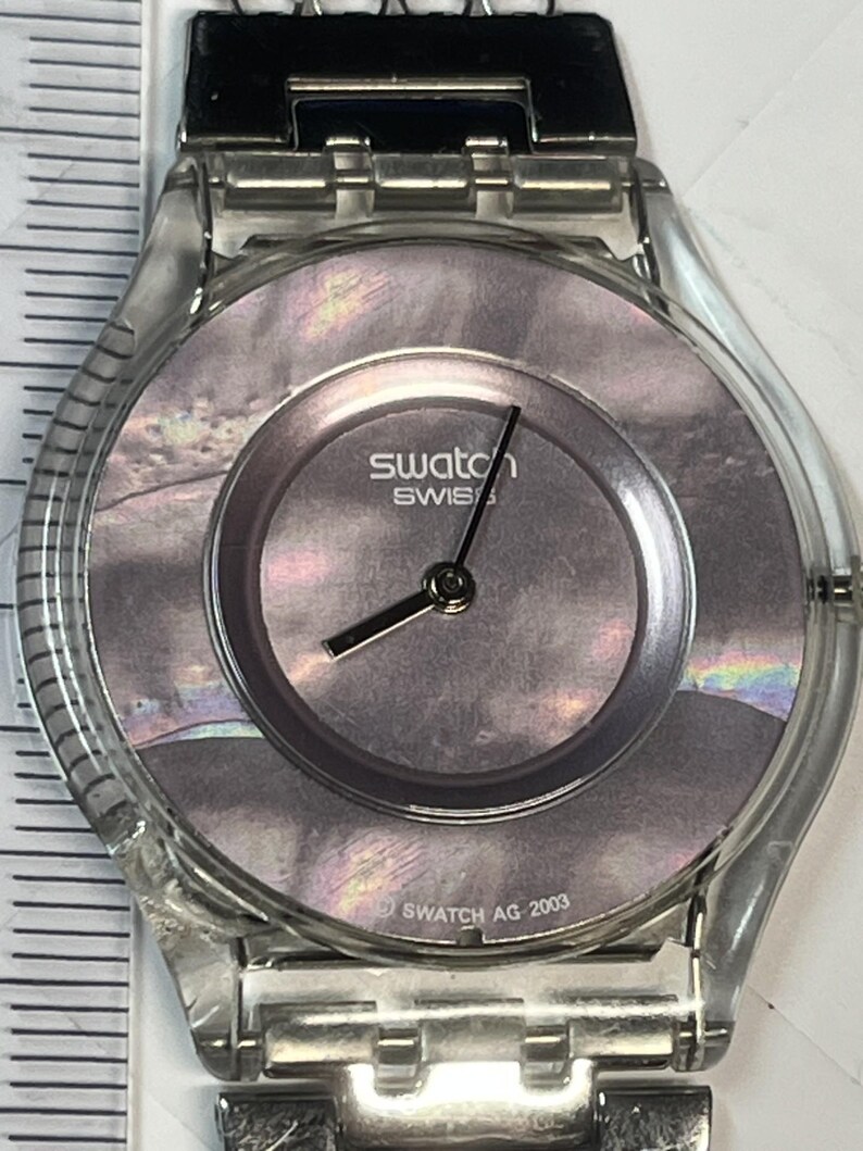 Swatch Skin Series Wristwatch. Features a Mother-of-pearl Dial & a ...