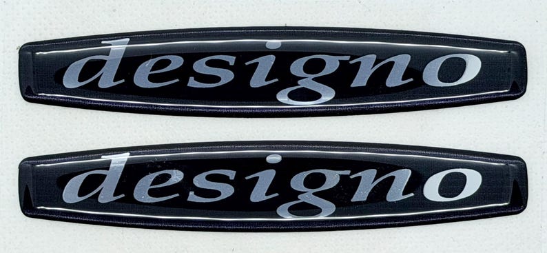 Designo Car Emblem - 2pcs 70x13mm 3D Domed Gel Sticker | Black Chrome ...