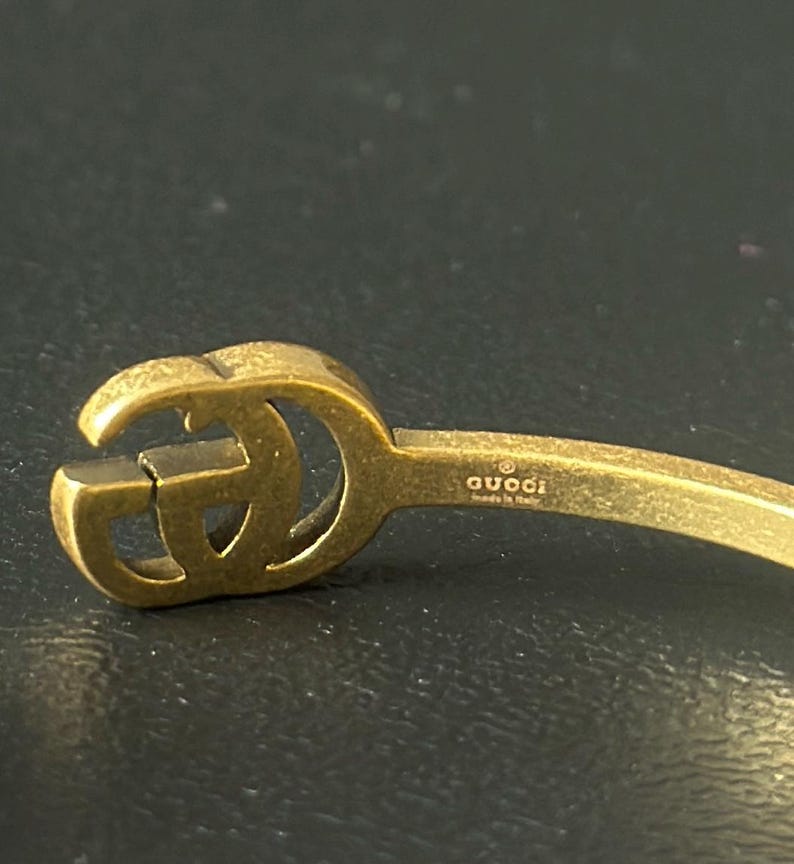 VTG Gucci GG Golden Bangle Bracelet Steel Double GG Monogram Vintage ...