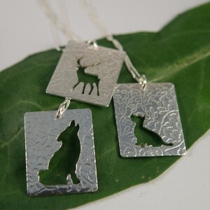 Silver Wolf Pendant: A Howling Wolf Silhouetted in Eco Silver - Etsy