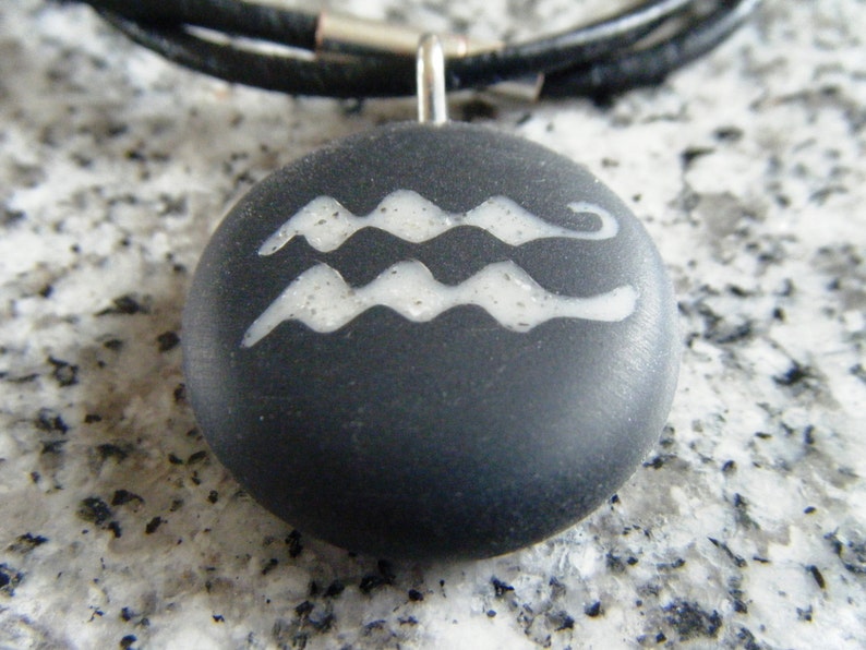 Aquarius Zodiac Signs Hand Carved On A Polymer Clay Black Etsy