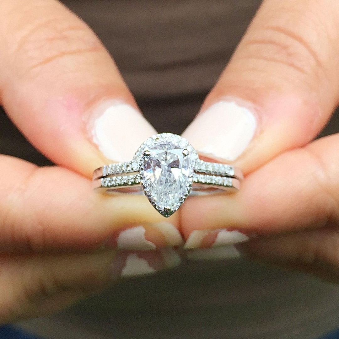 Pear Shape and Round Cut Sides Diamond Engagement Ring and Matching ...