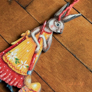 Easter Hanging Ornament Made From Wood, Featuring a Rabbit Painting an ...
