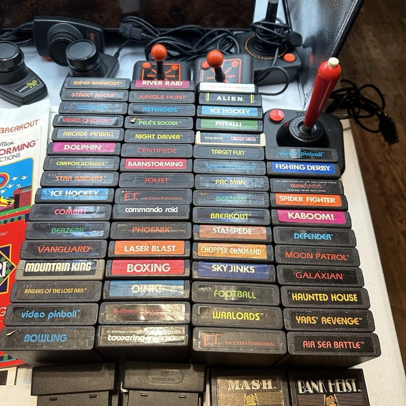 Tele-games Sears Atari Video Arcade Controllers 68 Games Booklets ...