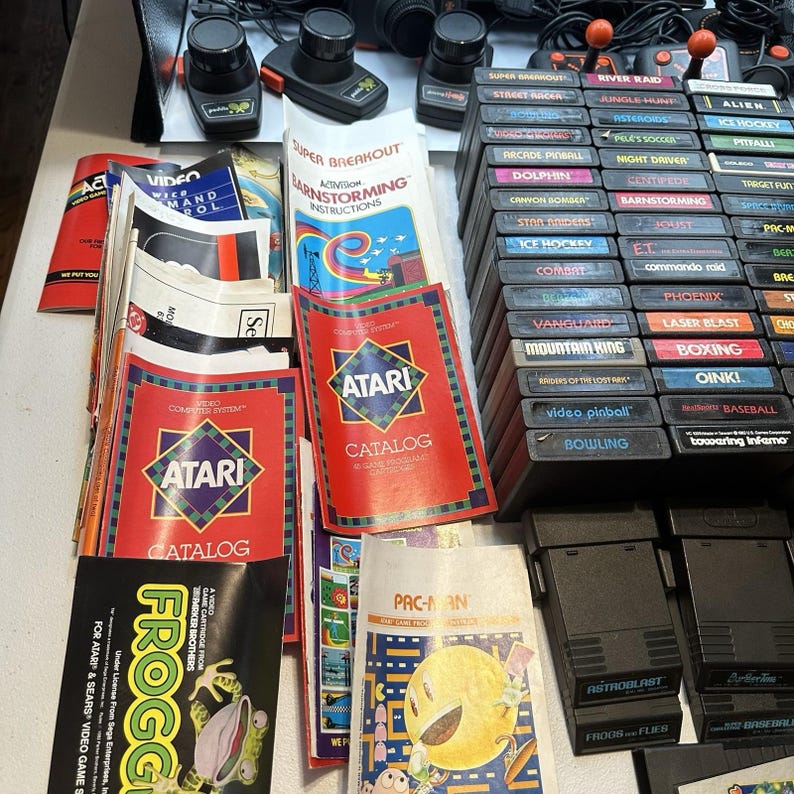 Tele-games Sears Atari Video Arcade Controllers 68 Games Booklets ...