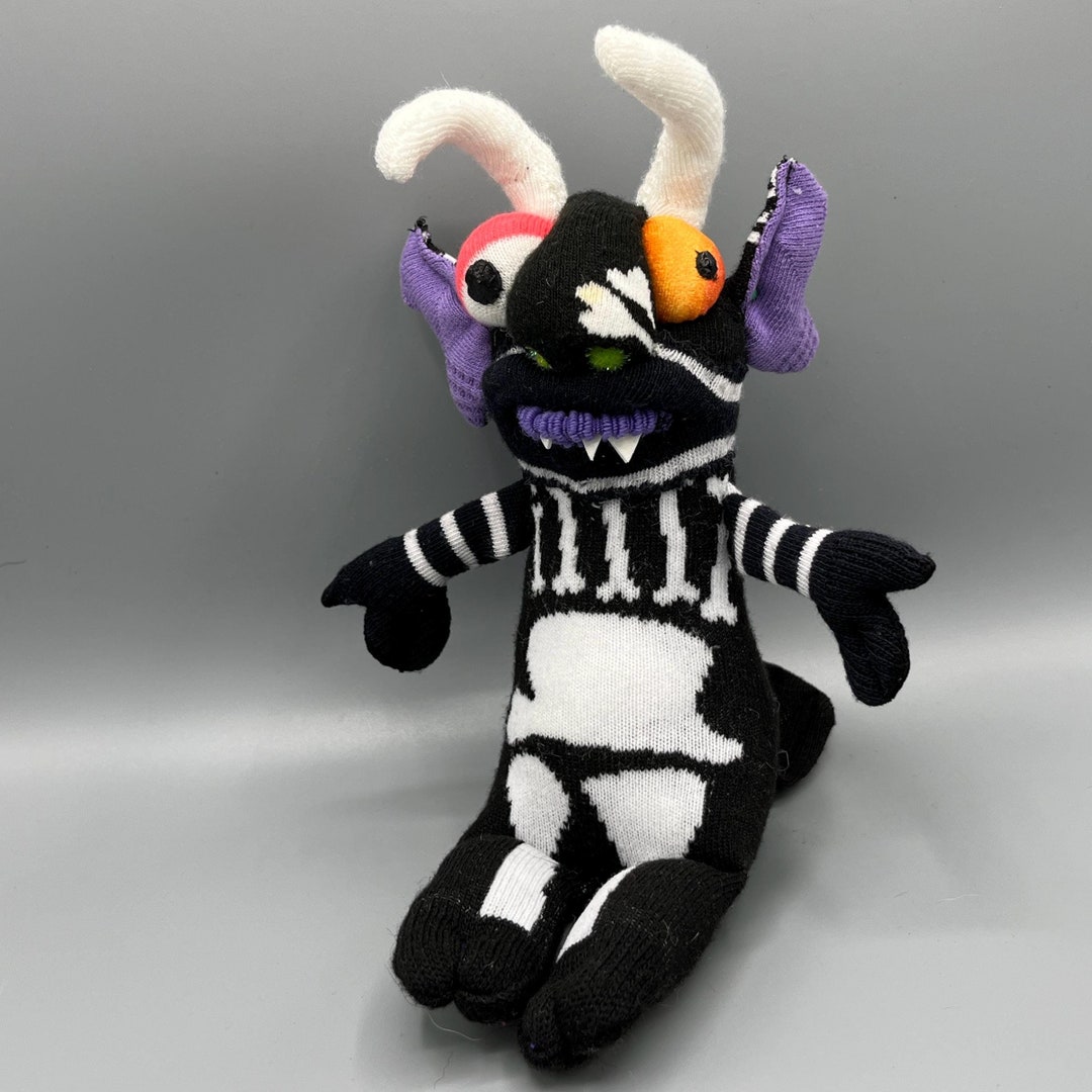 BOOGIE MAN is a Toothy Cockeyed Monster With Wayward Horns, a Pair of ...