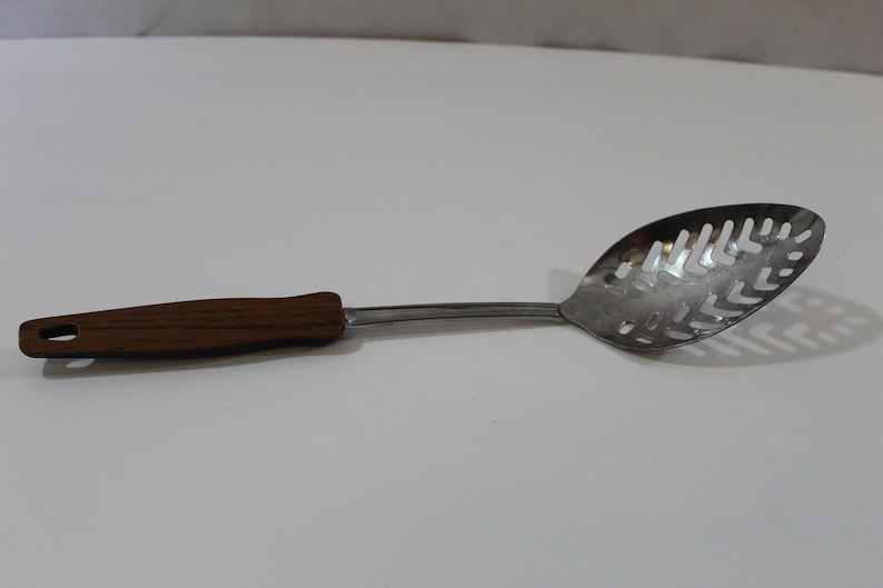 Vintage Ekco Faux Wood Grain Plastic Handled Slotted Serving Spoon ...