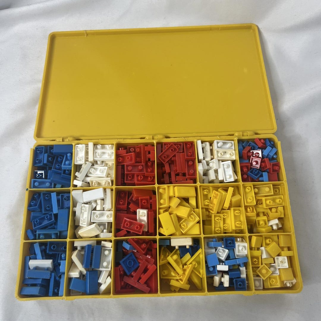 Vintage Yellow Plastic Box With Building Pieces Toy Red Blue White ...