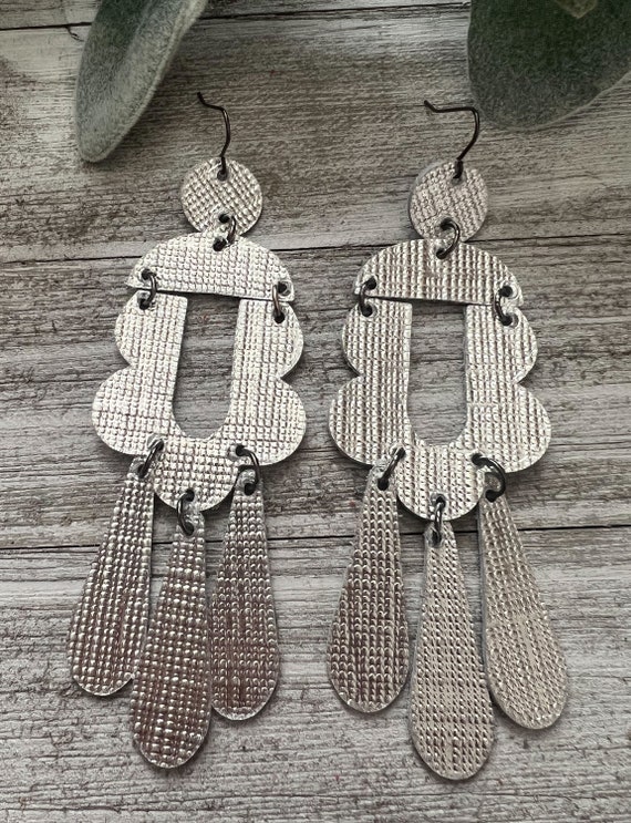 Large leather earrings store