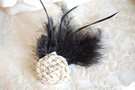 Items similar to Ivory rosette with black feathers hair clip on Etsy