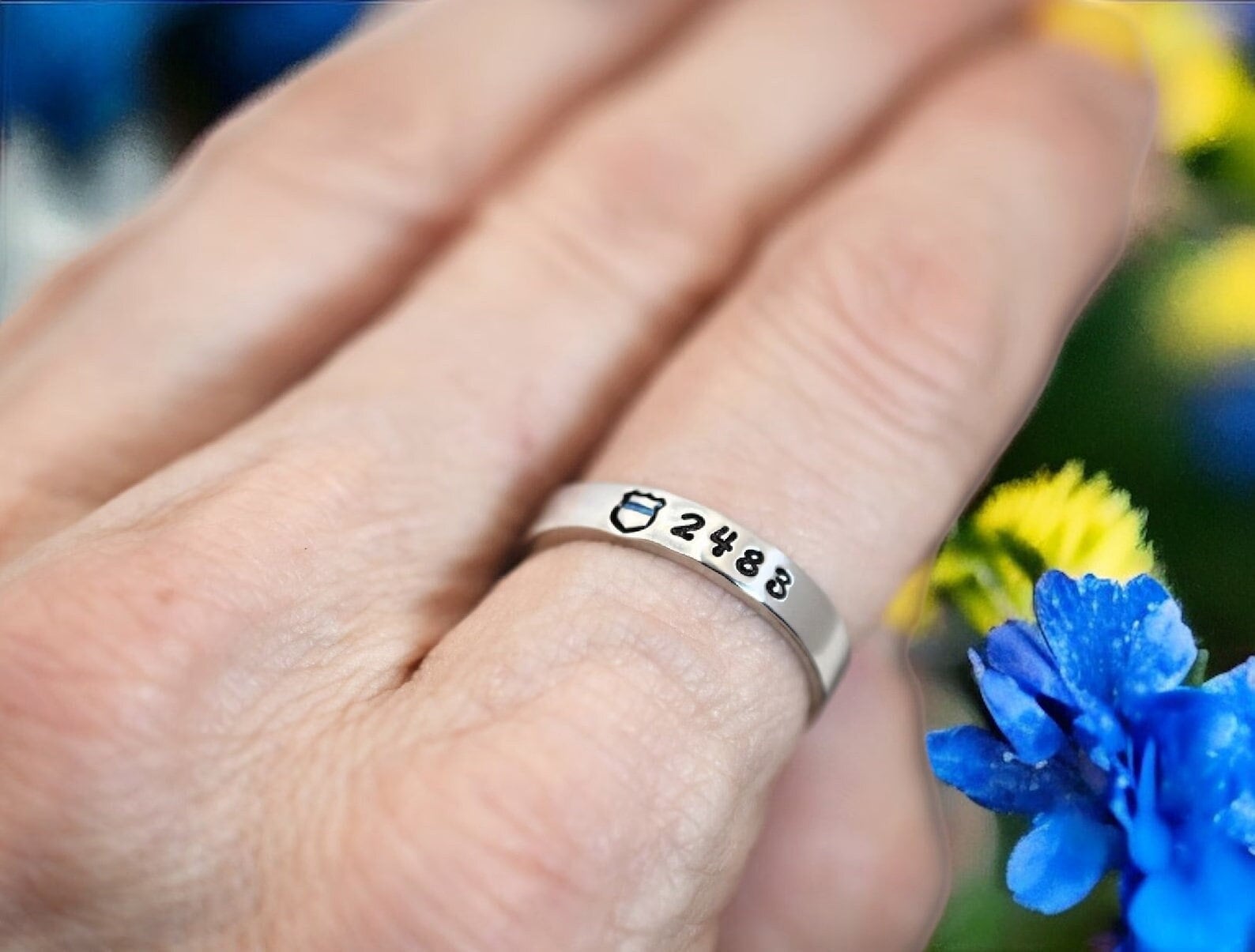 Blue line rings for her store