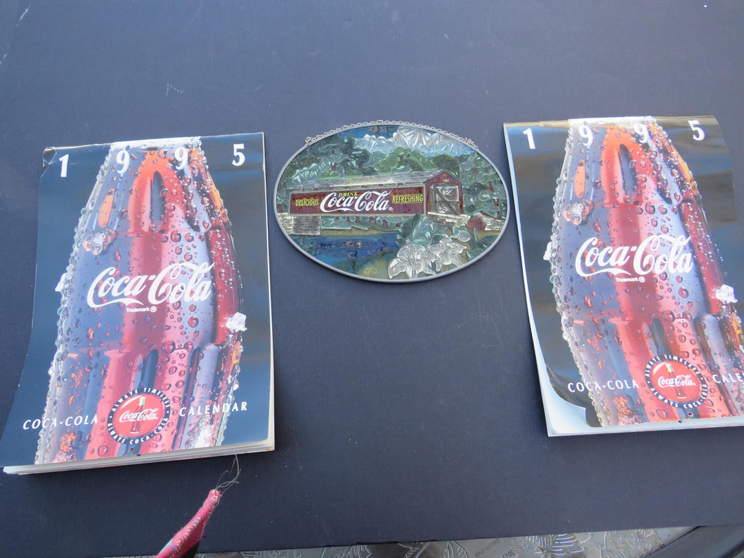Two 1995 Coca-cola Wall Calendars & One Oval Glass Coca-cola Suncatcher ...
