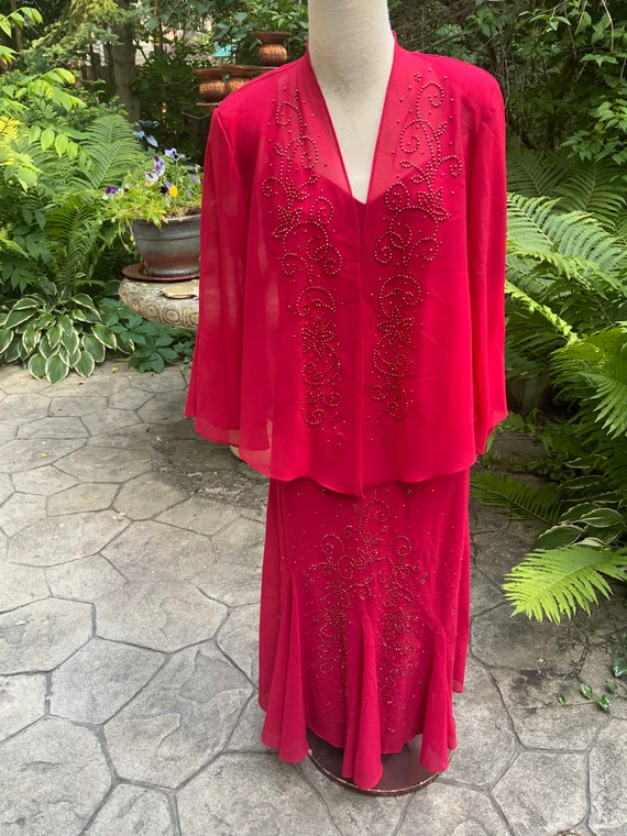 Kathy Roberts dazzling red suit with trumpet skirt an… - Gem