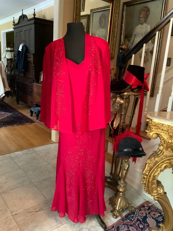 Kathy Roberts dazzling red suit with trumpet skirt an… - Gem