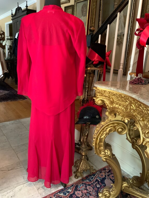 Kathy Roberts dazzling red suit with trumpet skirt an… - Gem