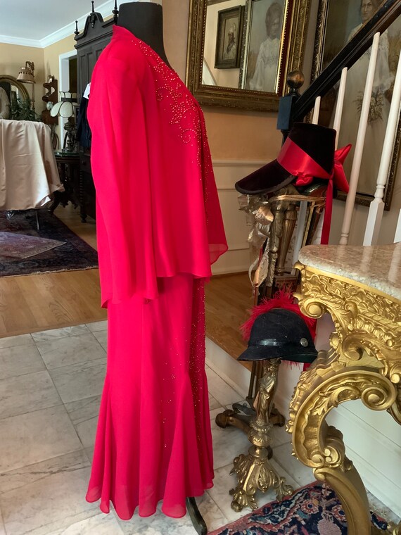 Kathy Roberts dazzling red suit with trumpet skirt an… - Gem