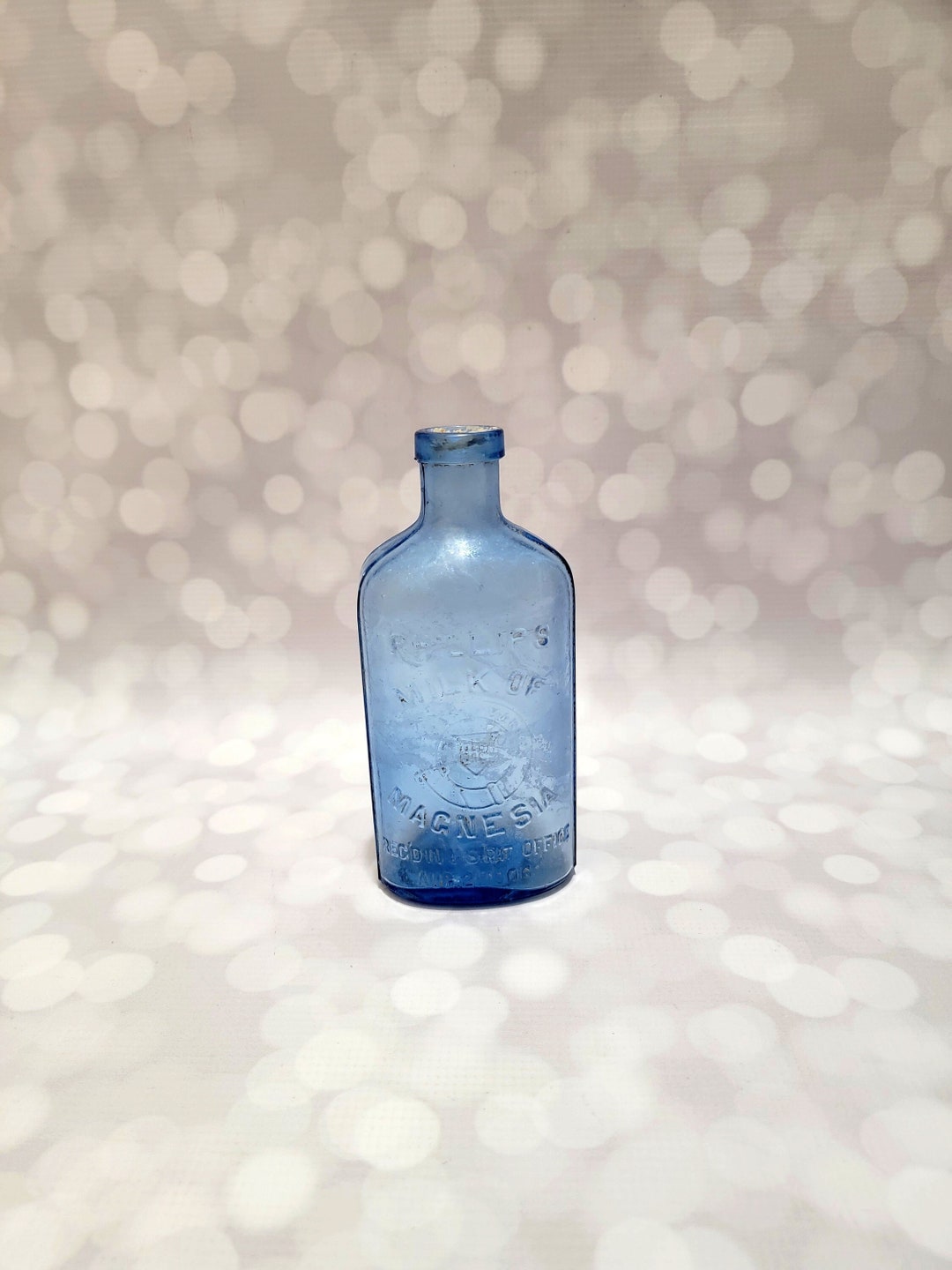 Vintage Blue Milk of Magnesia Bottle 1906 - Etsy