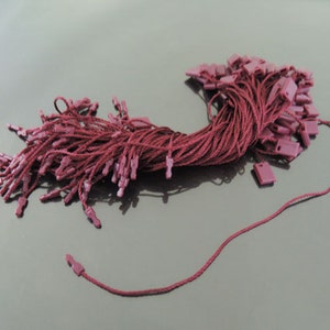 Hang Tag String - 100pcs Siam Red Hang Tag String With Plastic Fastener ...