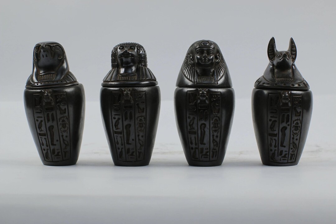 Organs Jars (canopic Jars)the Four Organs Jars Made From Egyptian Black ...