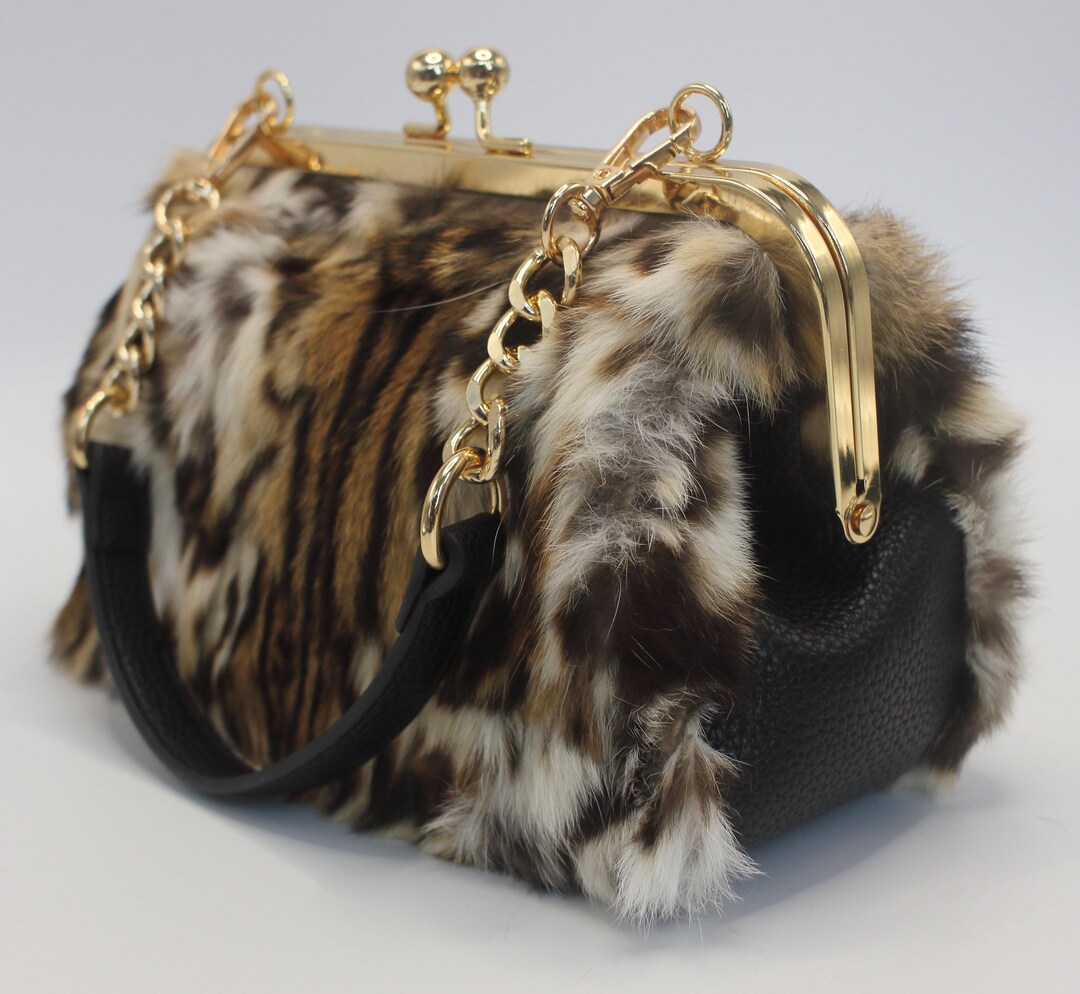 Exotic Feline Fur Kisslock Clutch: Ethical and Bold Animal Print ...