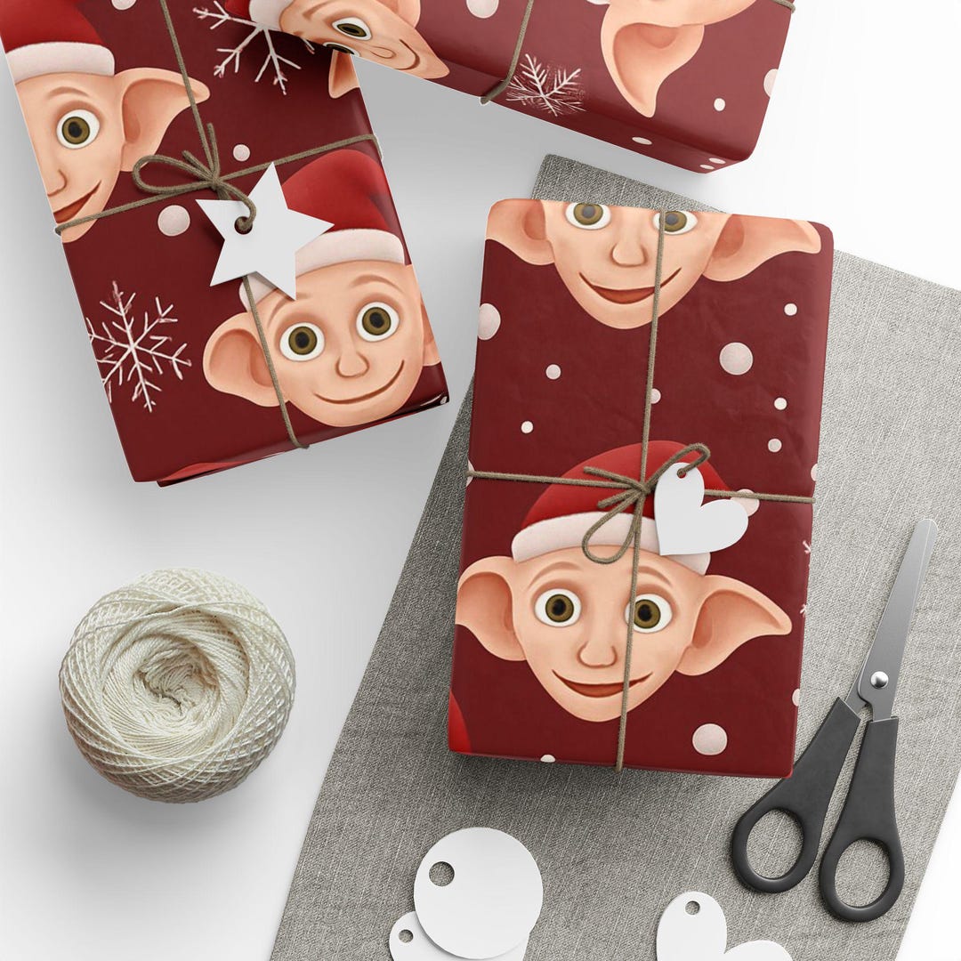 Festive DOBBY Holiday Wrapping Paper Featuring Santa Elf Faces ...