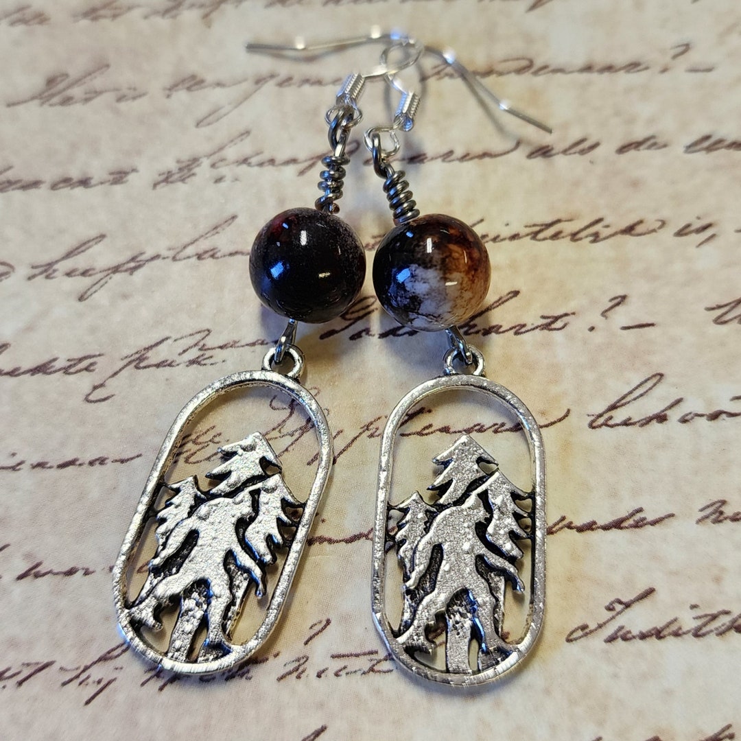 Sasquatch Bigfoot Dangle Earrings With Brown Red and Yellow Swirl Round ...