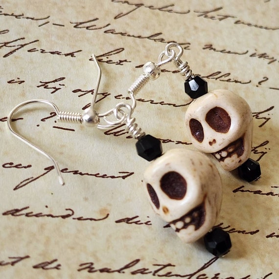 White Stone Skull Dangle Earrings with Black Faceted Beads