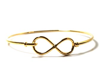 Gold infinity bangle | Etsy