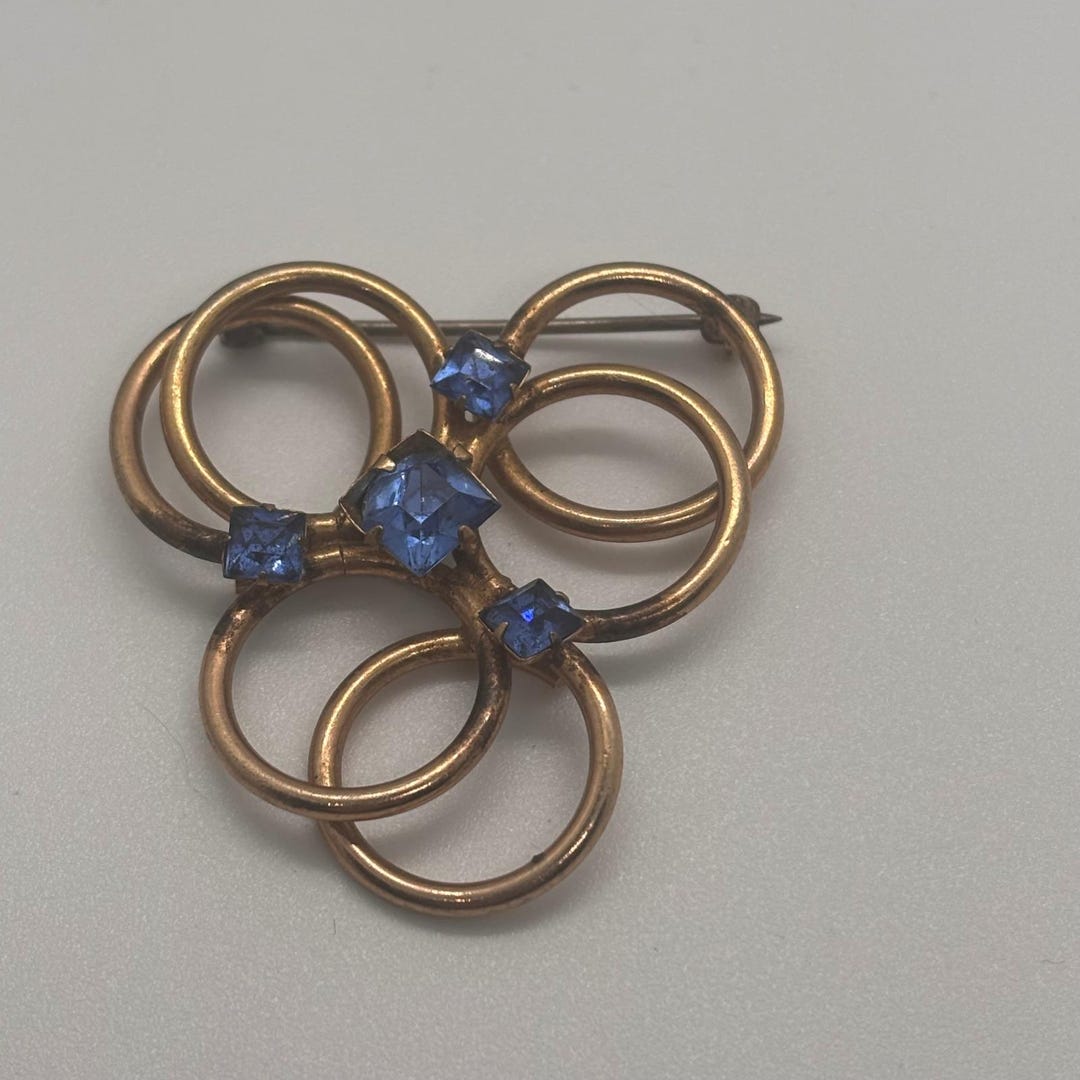 Vintage Gold Tone Interlocking Circles Brooch Blue Rhinestone Pin Women ...