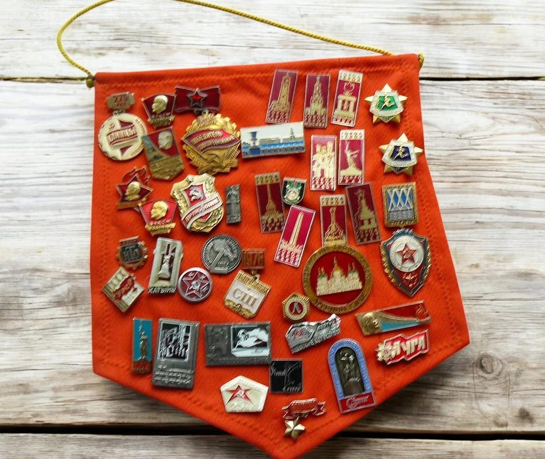 A Set of Vintage USSR Badges on a Pennant for Collection and Decoration ...