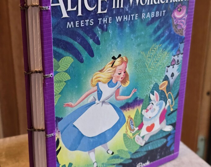 Repurposed Alice in Wonderland Meets the White Rabbit (1994) - Journal ...