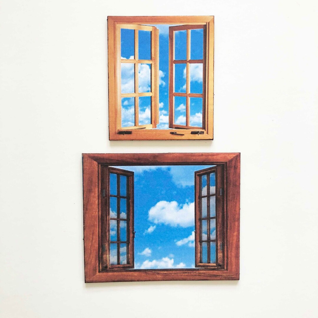 Miniature Paper Windows With View of White Clouds in a Blue Sky Two ...
