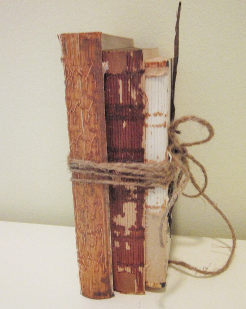 Unbound Books // Three Vintage Books Tied With Jute Twine With Feather ...
