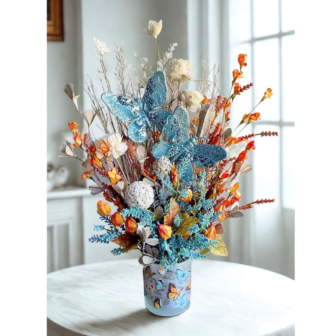 Sparkly Blue Butterflies With Orange Flowers in Butterfly Vase ...