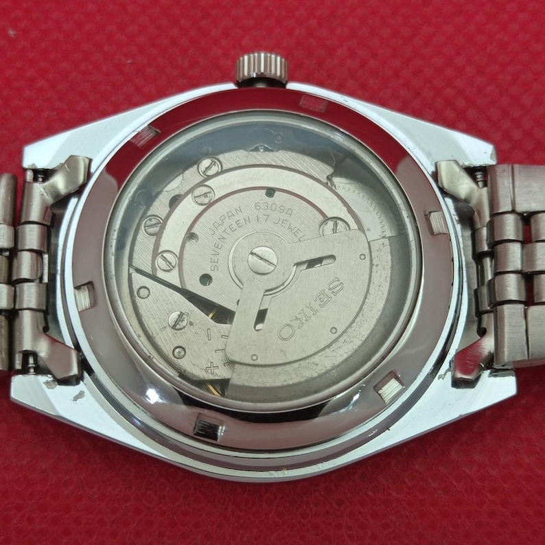 Vintage Seiko 5 Automatic Watch: Red Dial, Transparent Back, Day-date ...