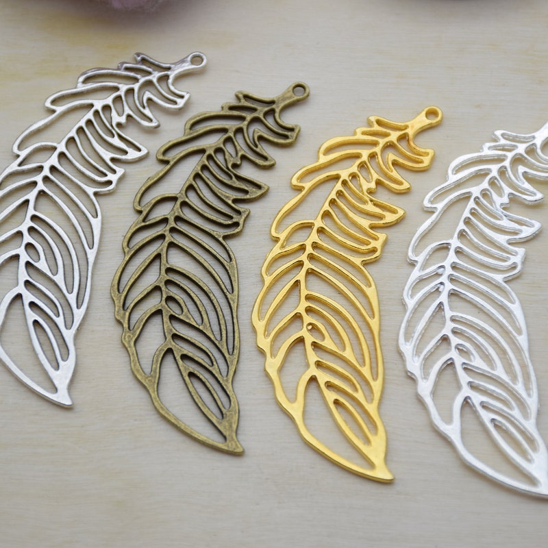 Metal Feathers - Etsy