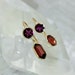 Vivid Rhodolite Purple Star and Red Hexagon Garnet Drop Earrings in ...
