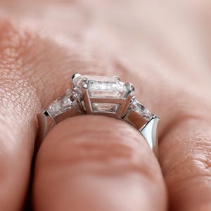 Emerald Cut Three Stone Engagement Ring - Emryn by Sevgi Jewelry • Calf ...