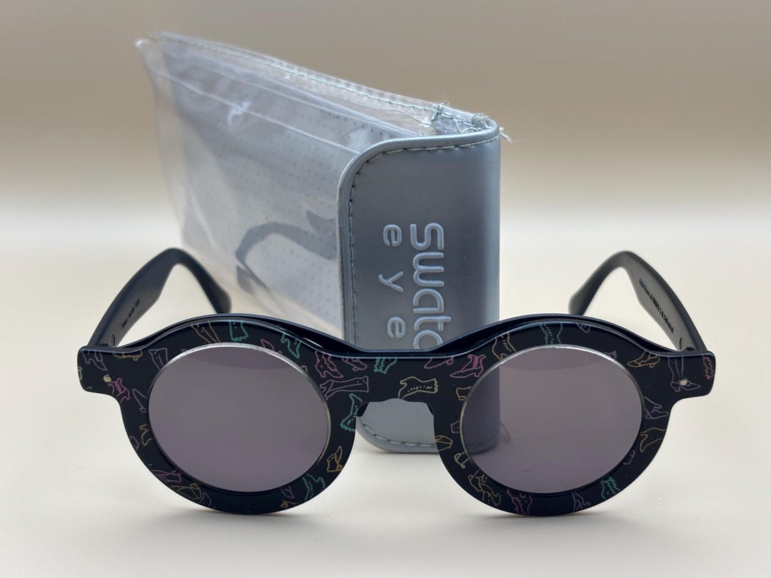 Swatch Eyes 90s – Round Black Glasses With Multi-colored Shoe Designs ...