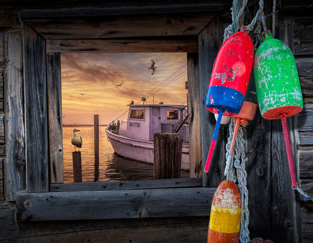 Fishing Buoys Hanging by a Window Overlooking Fishing Boat and Gulls in ...