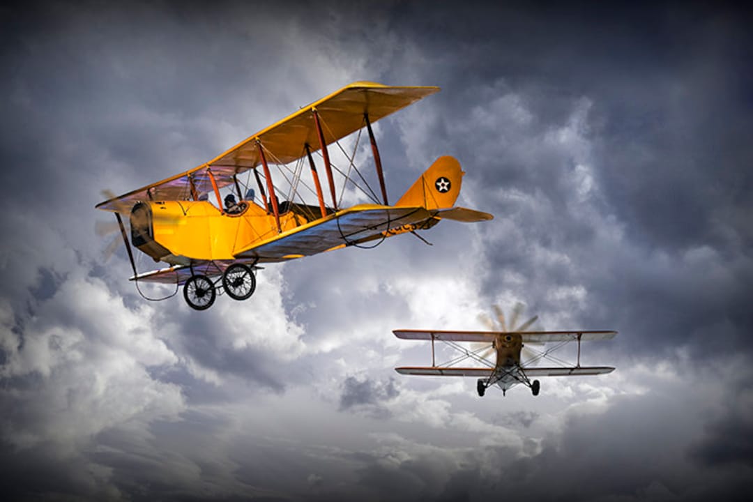 Vintage Biplanes in Flight Among the Clouds, Classic Airplanes With ...