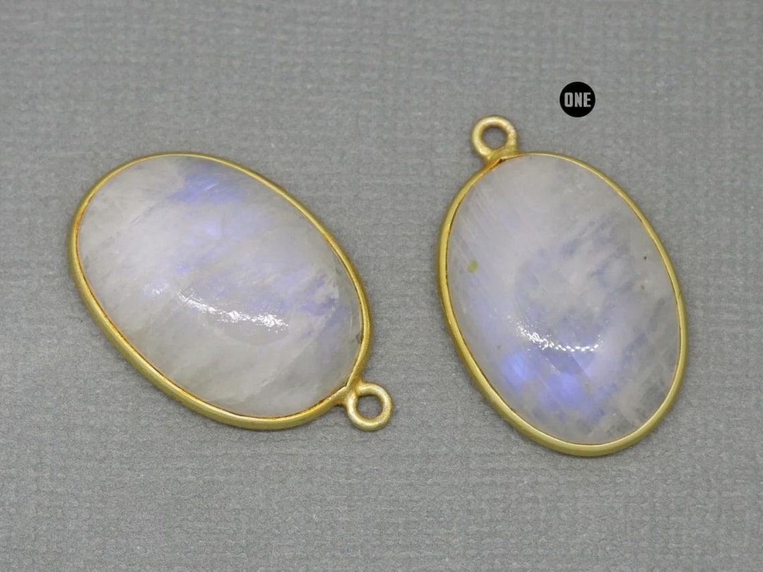 Moldura oval lisa em pedra da lua arco-íris banhada a ouro, 25X16 mm ...